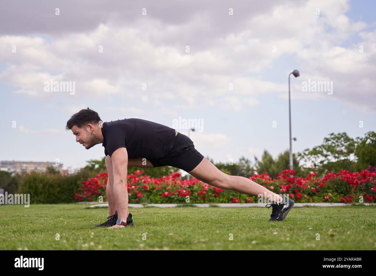 Guy stretching body muscles on hi-res stock photography and images - Alamy