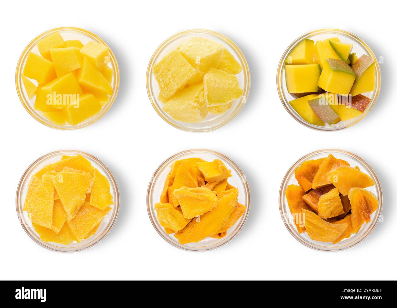 Assorted dried mango slices and bites with frozen and freezed mangoes ...