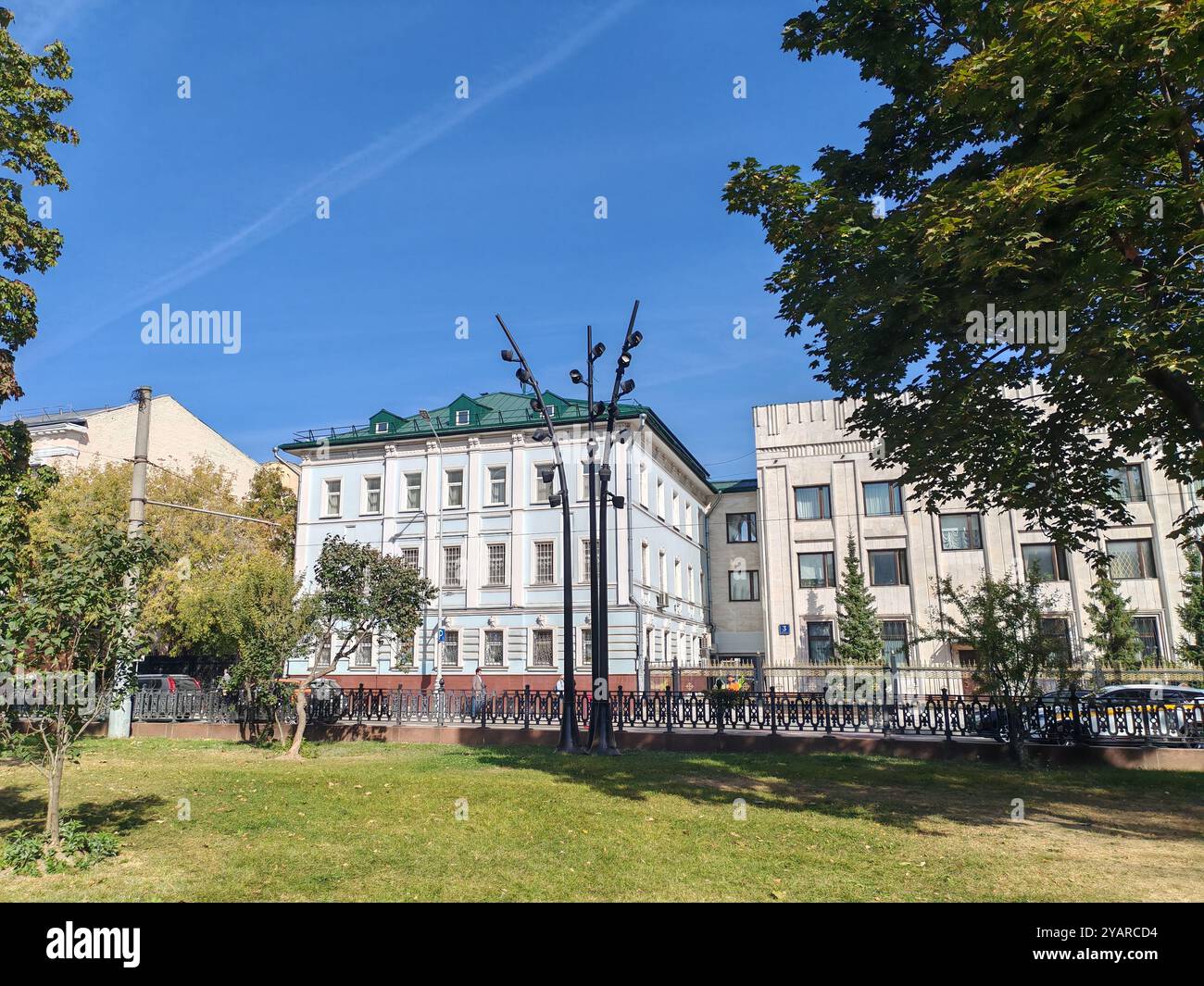 two-story classical building with intricate architectural details ...