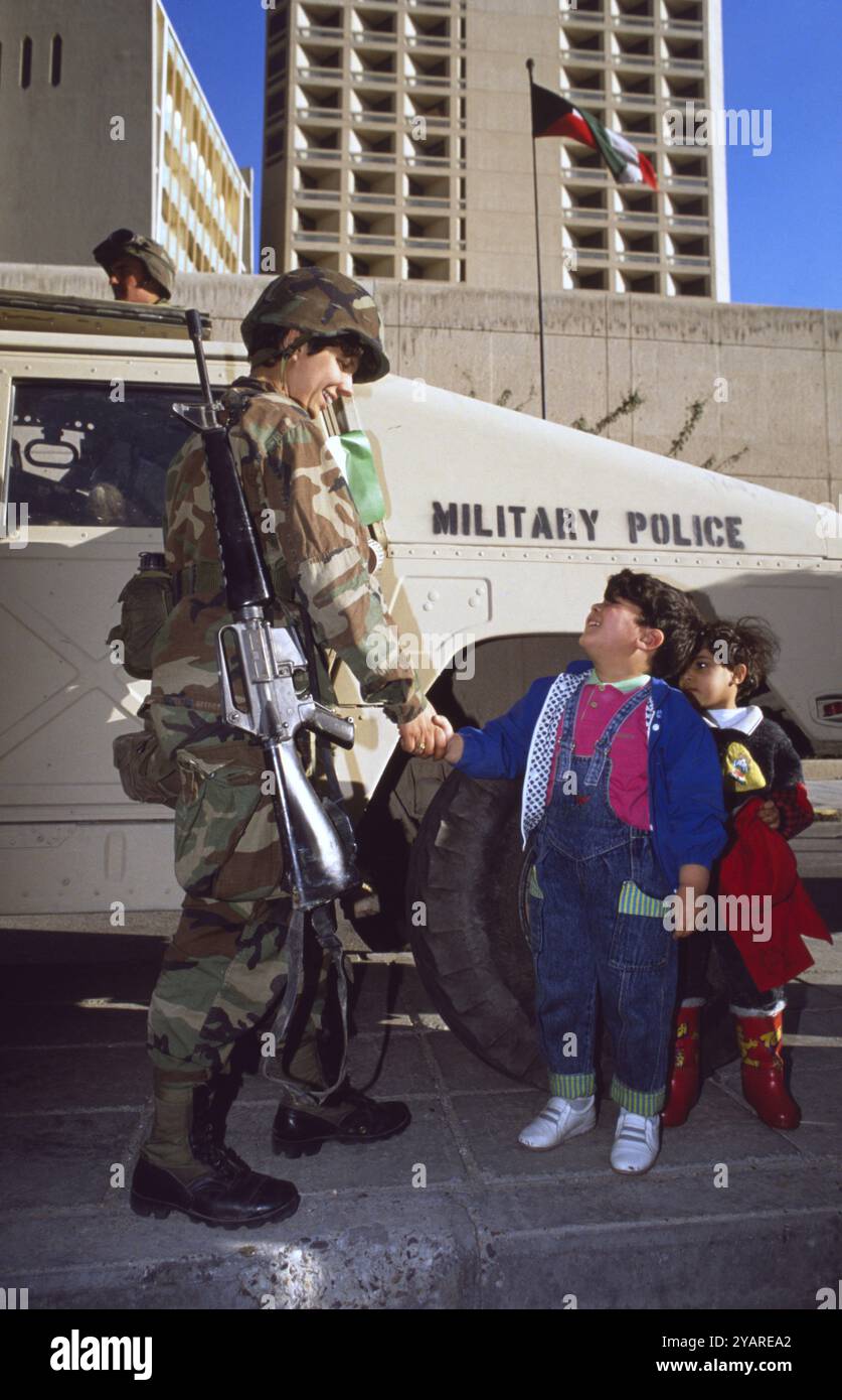 First Gulf War: 8th March 1991 A Kuwaiti child shakes hands with a ...