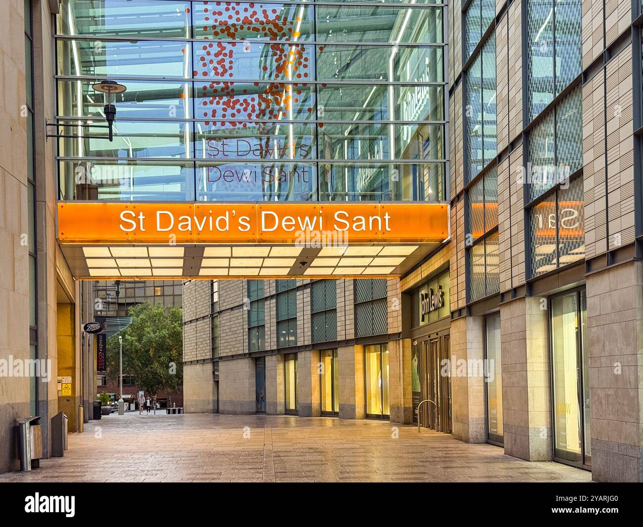 Cardiff, Wales - 6 October 2024L Sign on a glass walkway connecting two ...