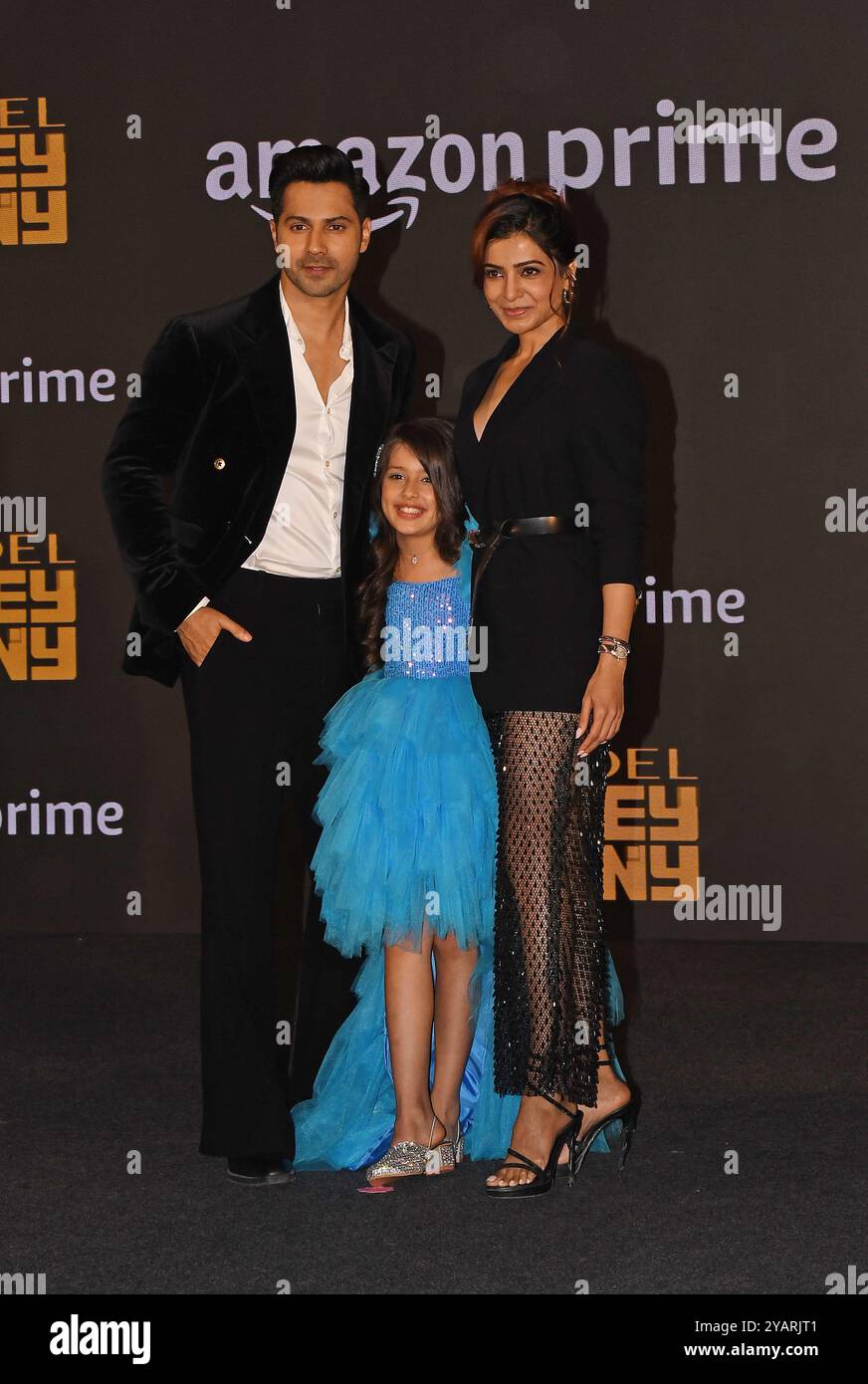 Mumbai, India. 15th Oct, 2024. L-R Bollywood actor Varun Dhawan, child ...