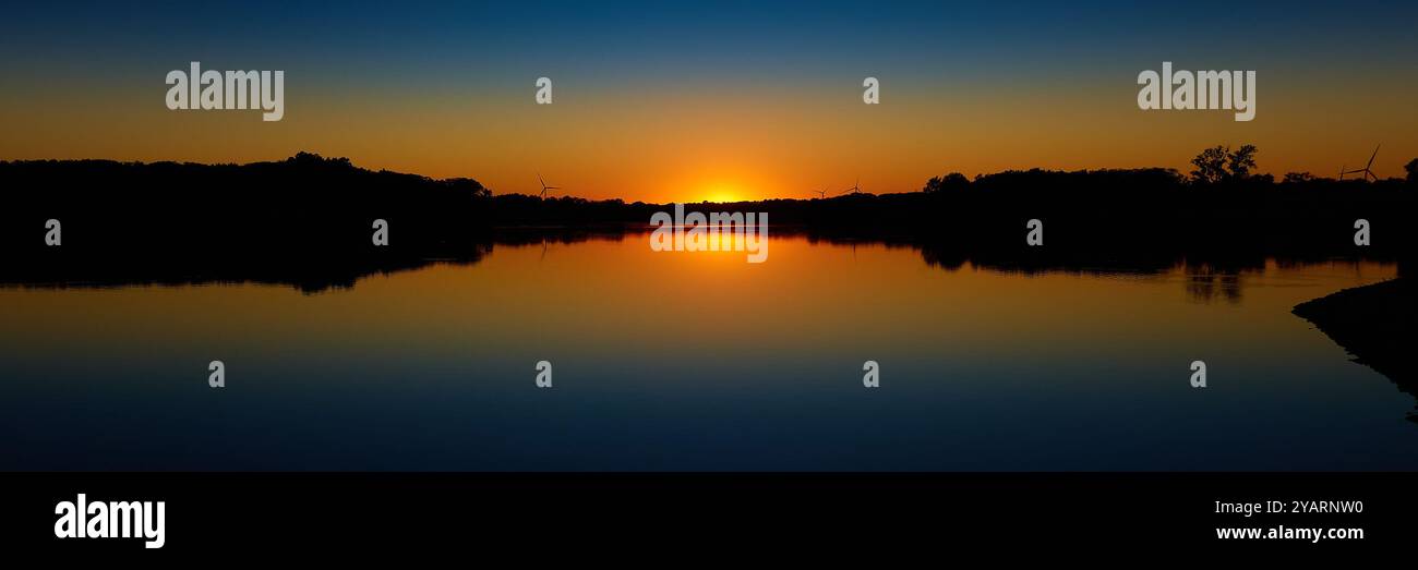 Sunset at Pony Express Lake with windmills, Missouri Stock Photo - Alamy