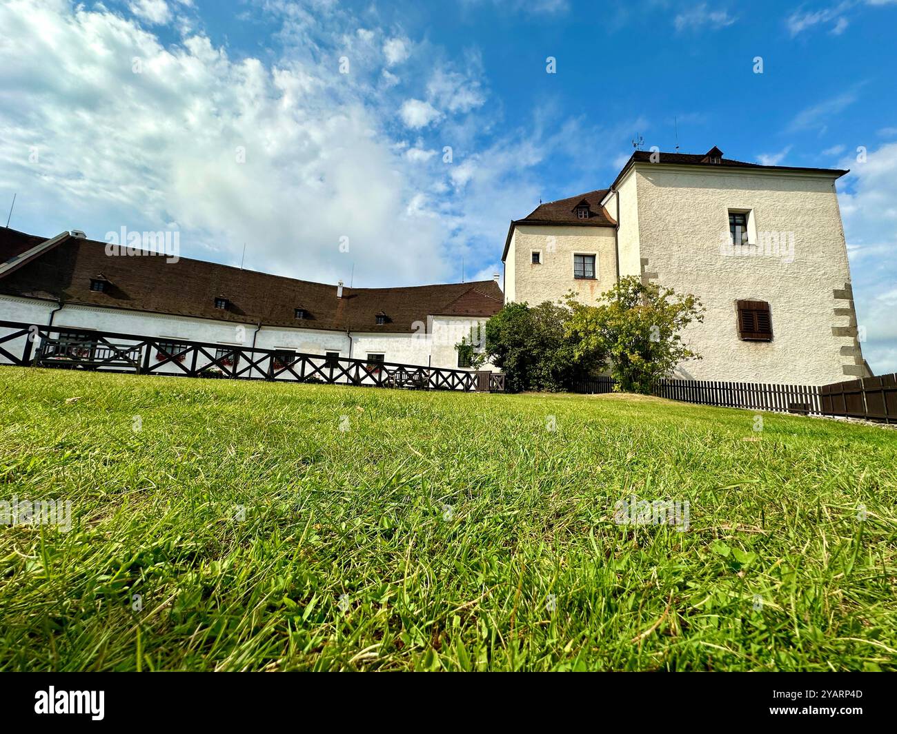 A photograph captures a historic castle on a summer day in Europe Stock ...