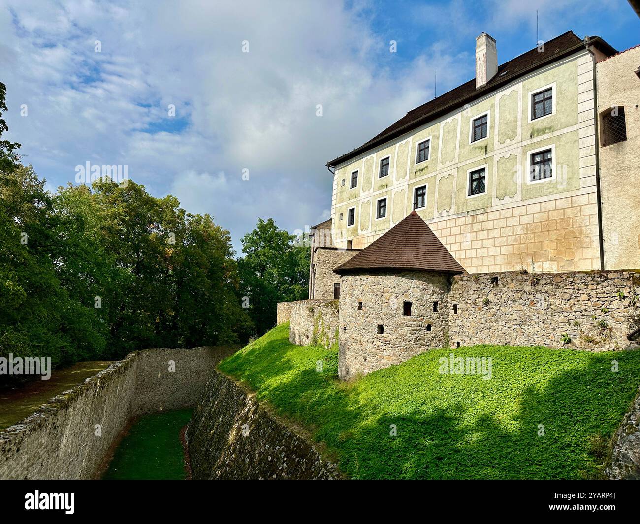A photograph captures a historic castle on a summer day in Europe Stock ...