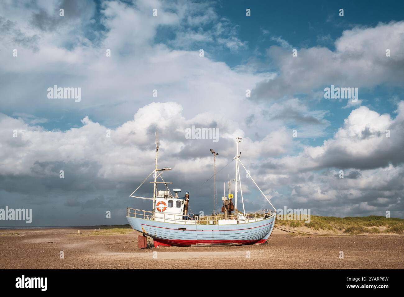Fishing boats on the beach at Slettestrand on the North Sea, Jutland ...