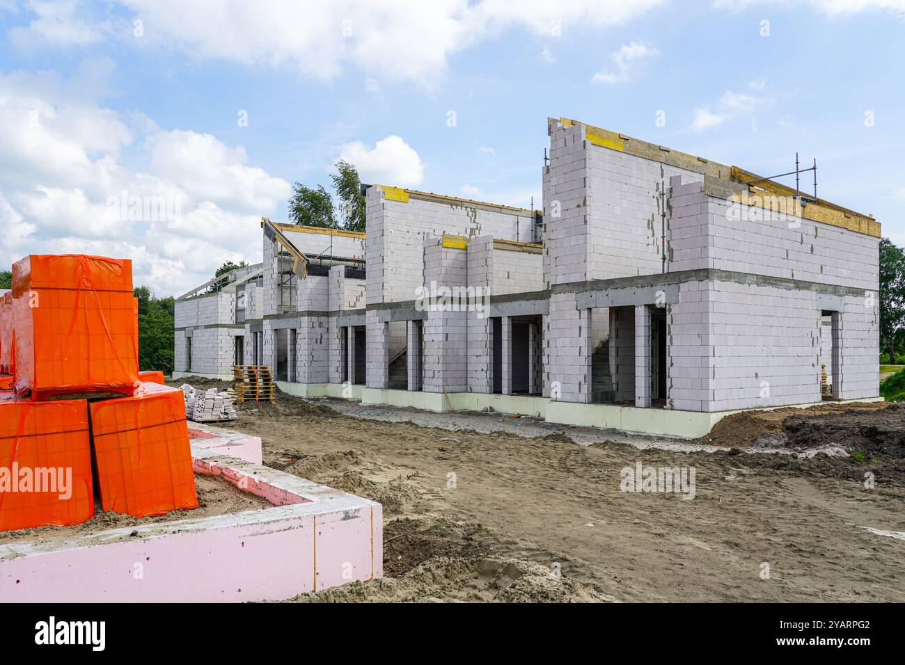 Construction of a new residential terraced house from expanded clay ...