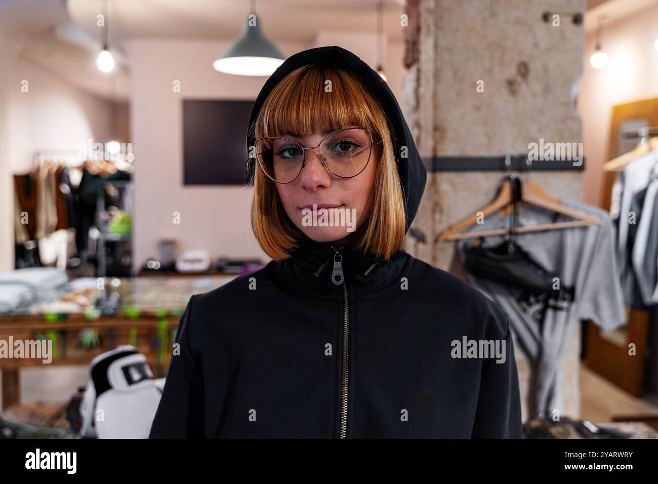 young model with glasses posing wearing casual clothes for a photoshoot ...