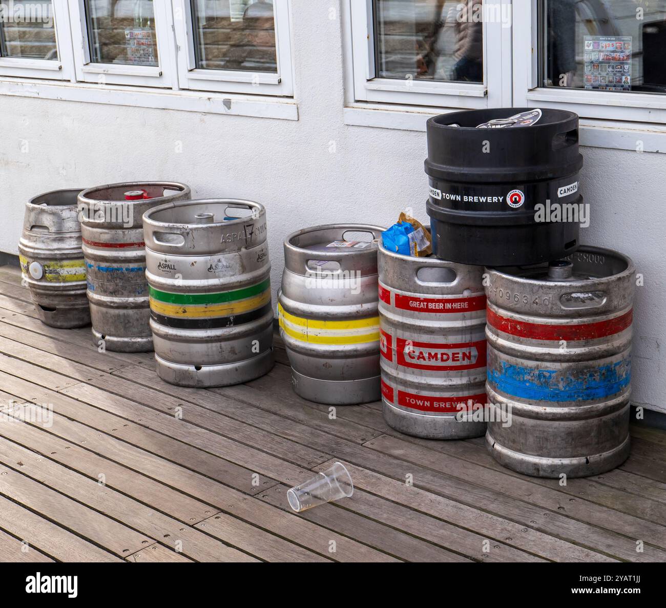 Empty beer barrels and beer kegs Stock Photo - Alamy