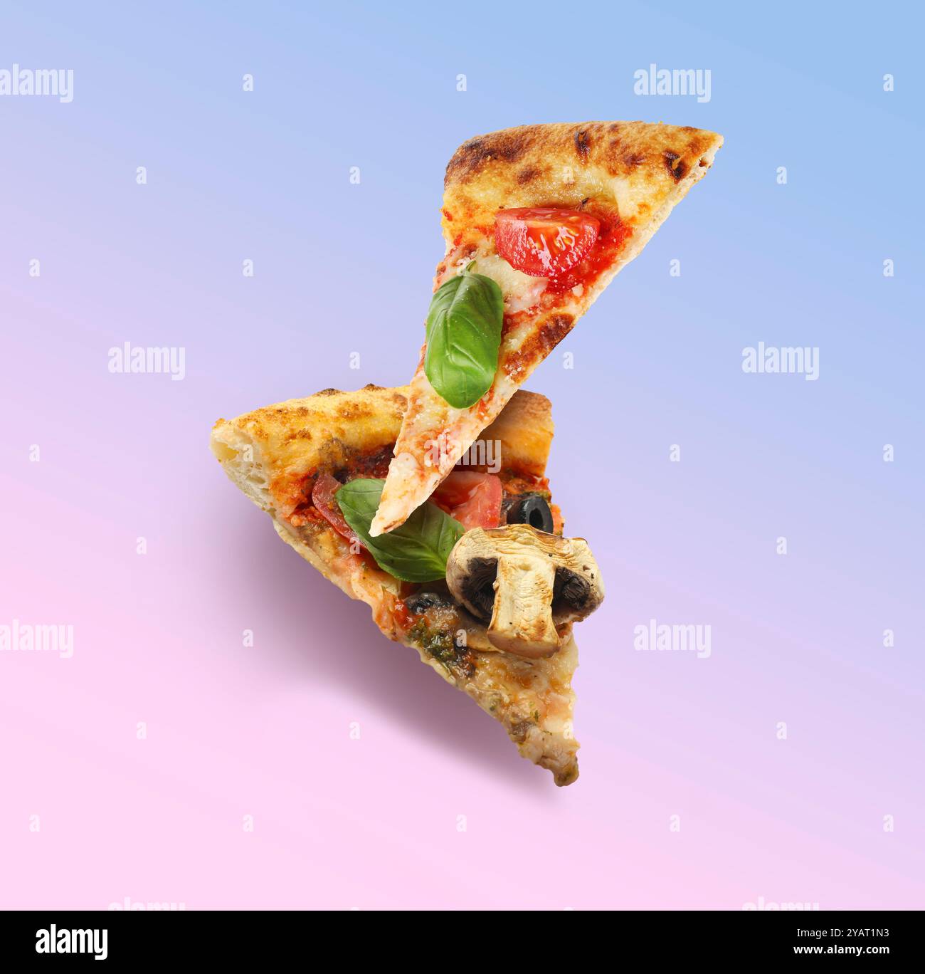 Pizza slices in air on gradient background Stock Photo - Alamy