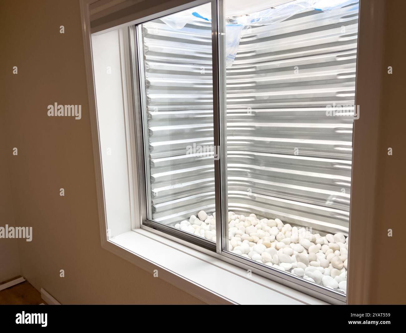 Window well installation hi-res stock photography and images - Alamy
