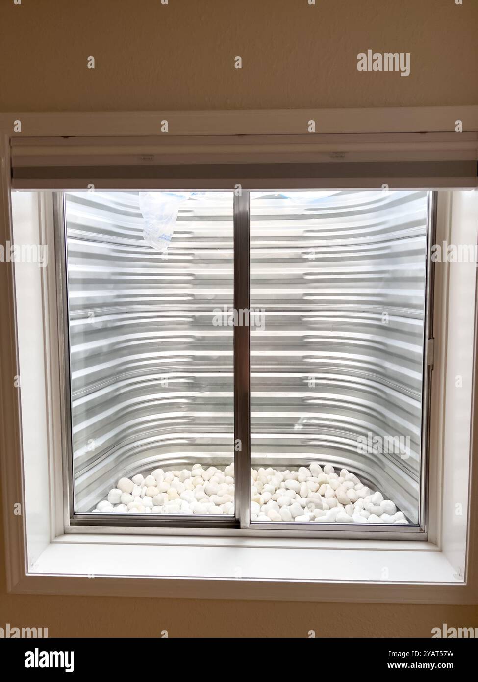 Window well installation hi-res stock photography and images - Alamy