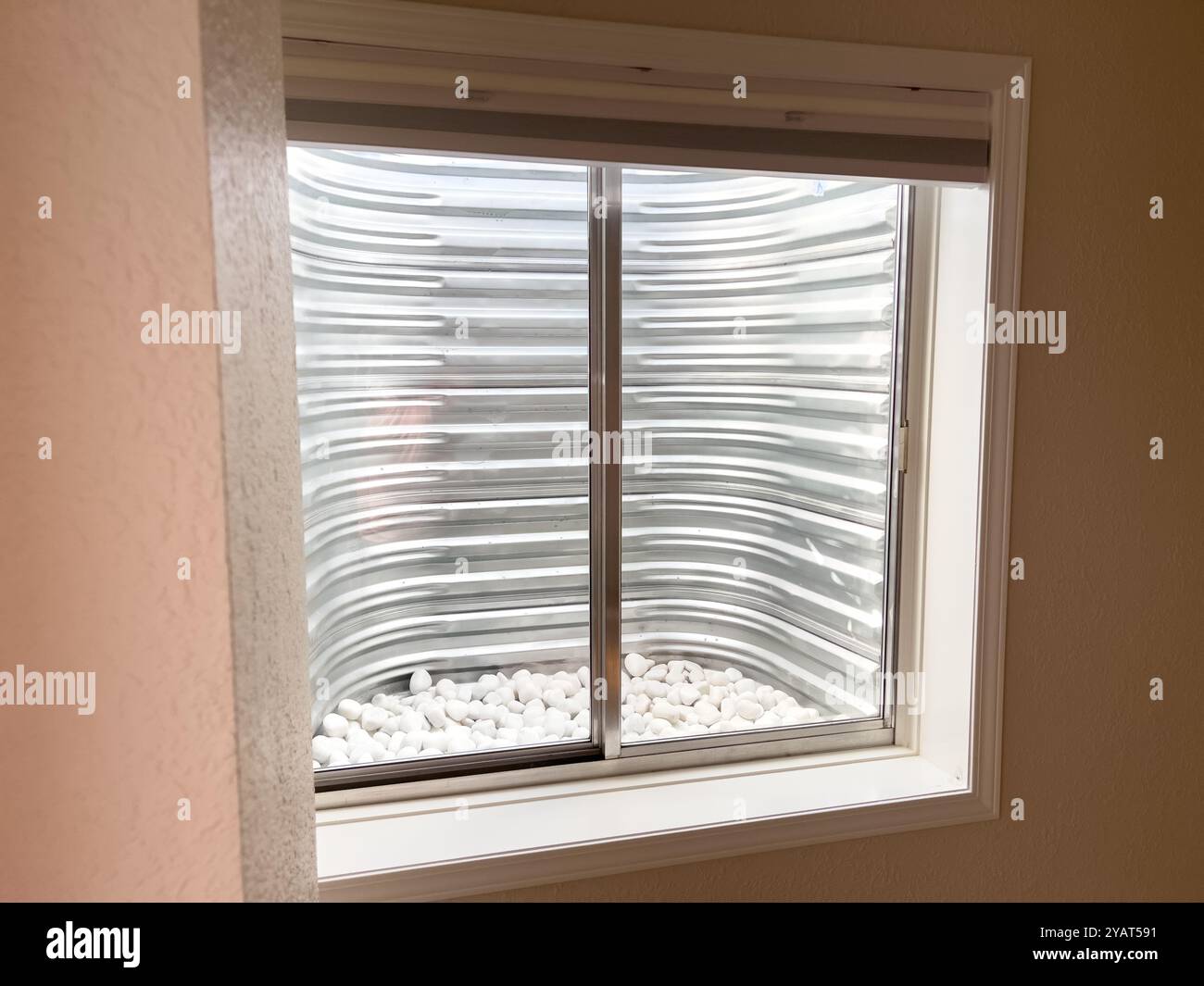 Window well installation hi-res stock photography and images - Alamy