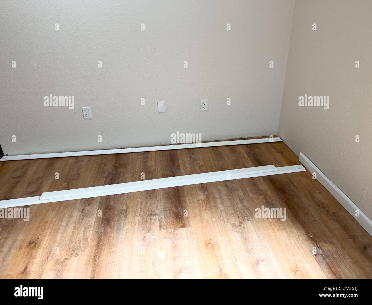 Installing baseboards hi-res stock photography and images - Alamy