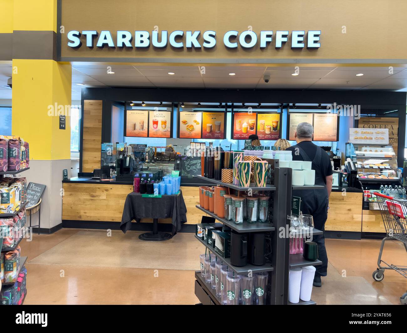 Starbucks Coffee Counter Inside Grocery Store with Customers Ordering ...