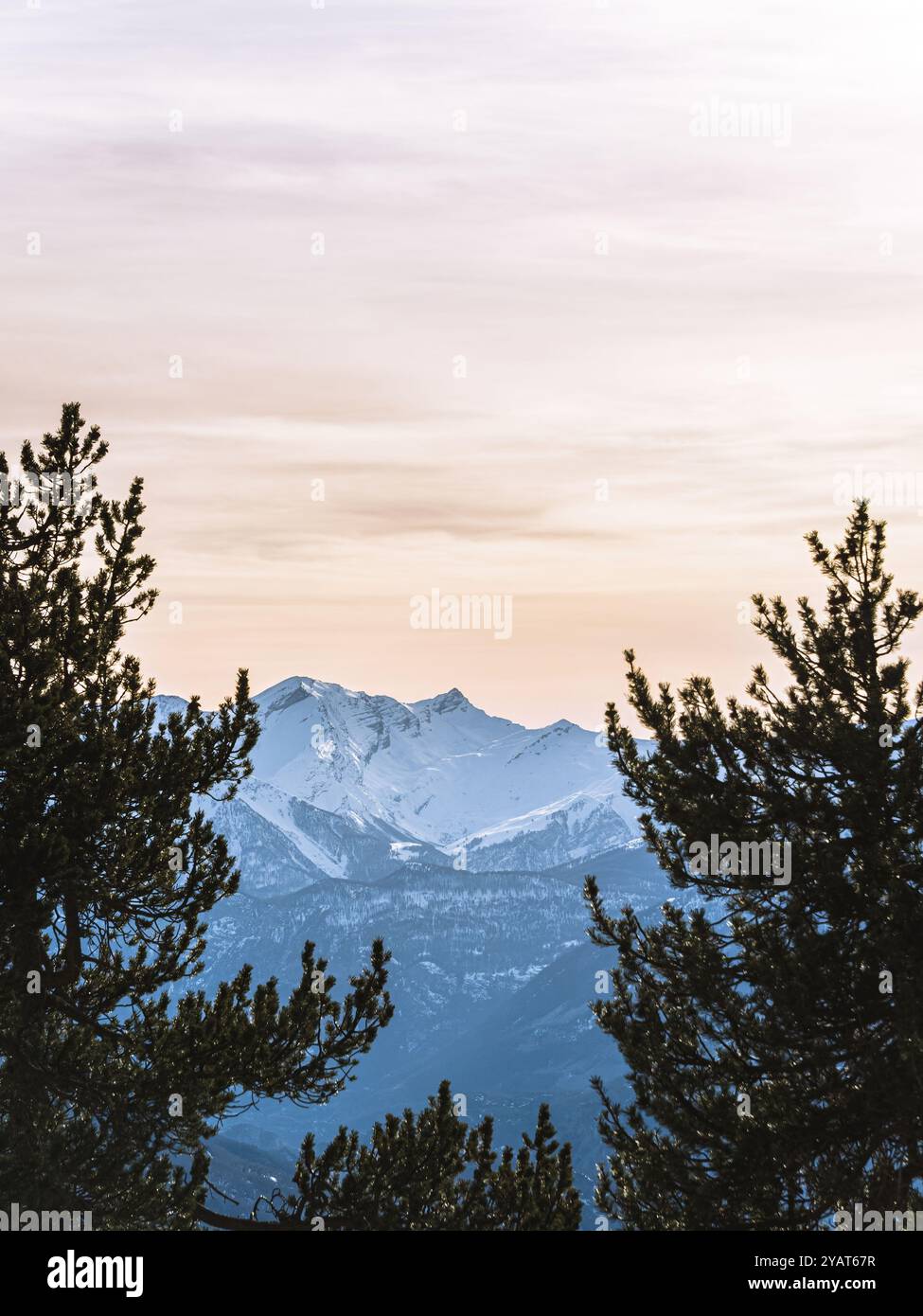A serene view of the snow-capped French Alps near Briançon, with ...