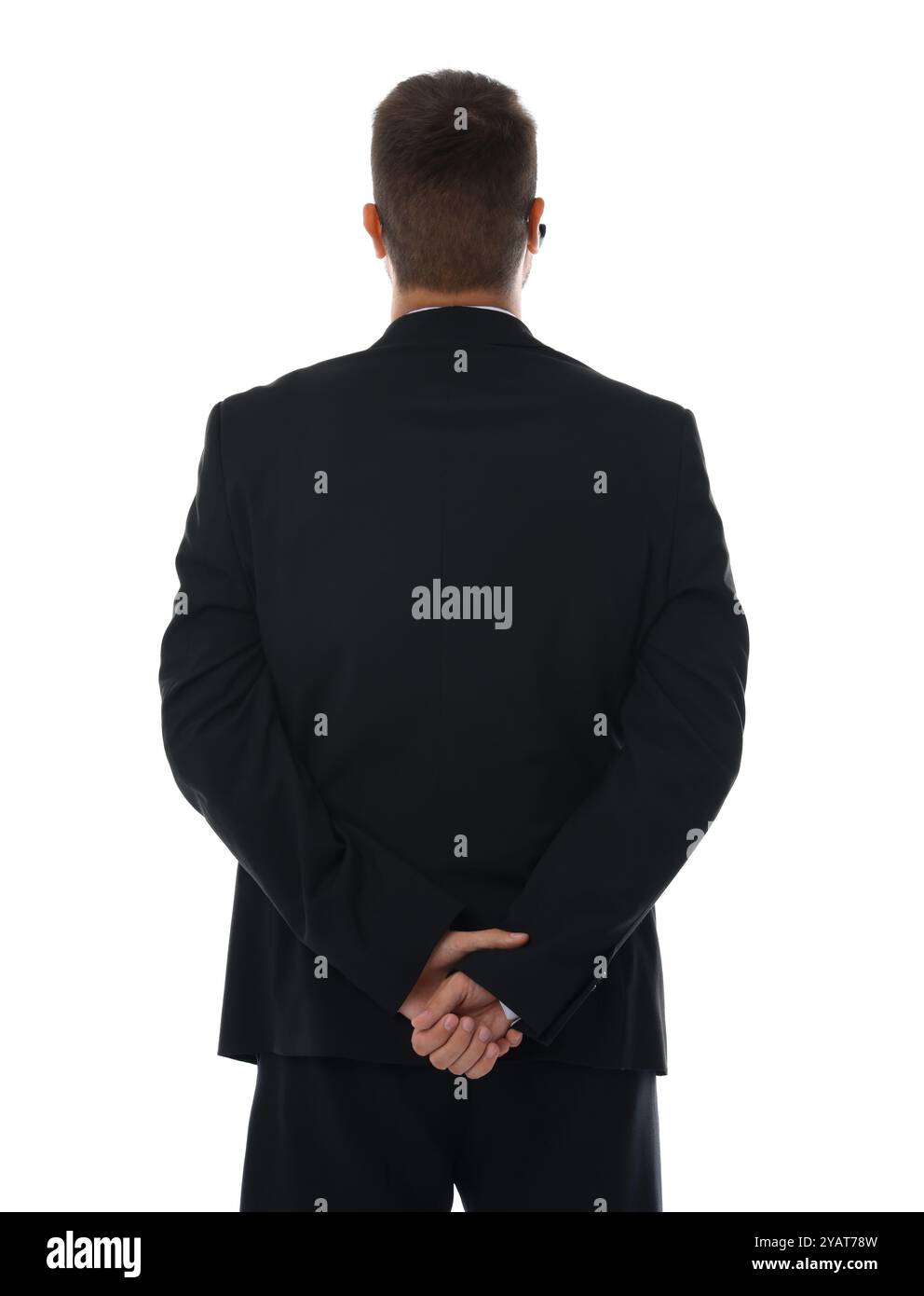 Bodyguard in suit isolated on white, back view Stock Photo - Alamy
