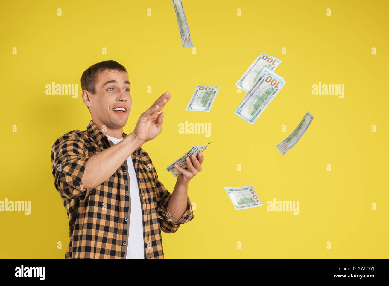 Happy rich man throwing money hi-res stock photography and images - Alamy