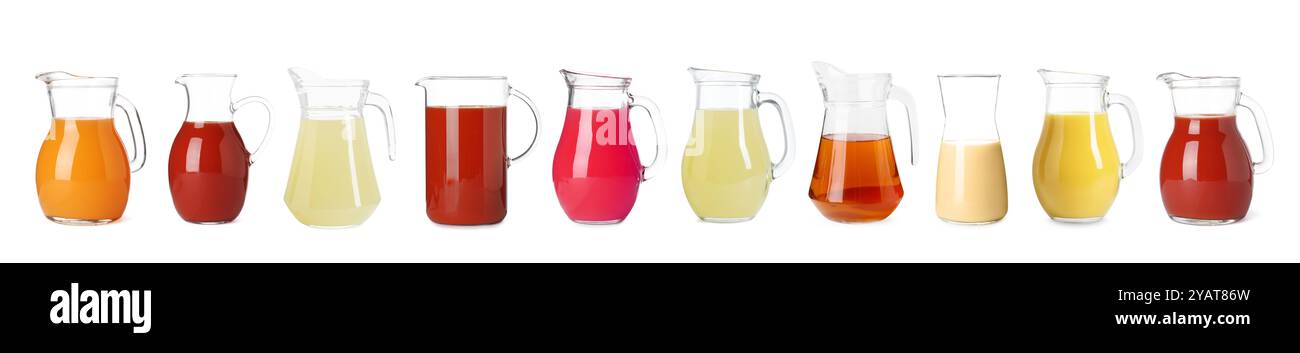 Glass jugs with different juices isolated on white, set Stock Photo - Alamy