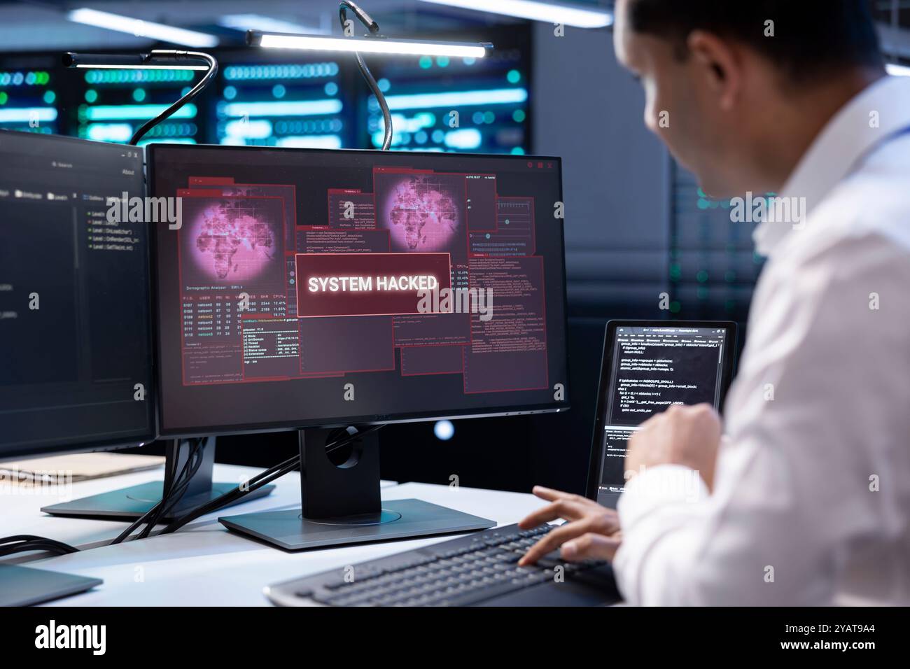 Admin in server hub trying to protect hardware from hacker attack stealing sensitive information ...
