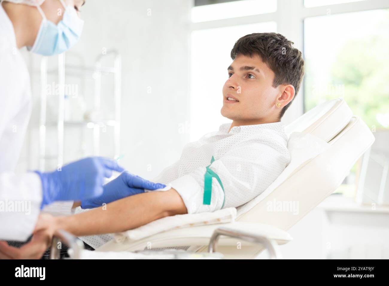 Intravenously injection male patient Stock Photo - Alamy