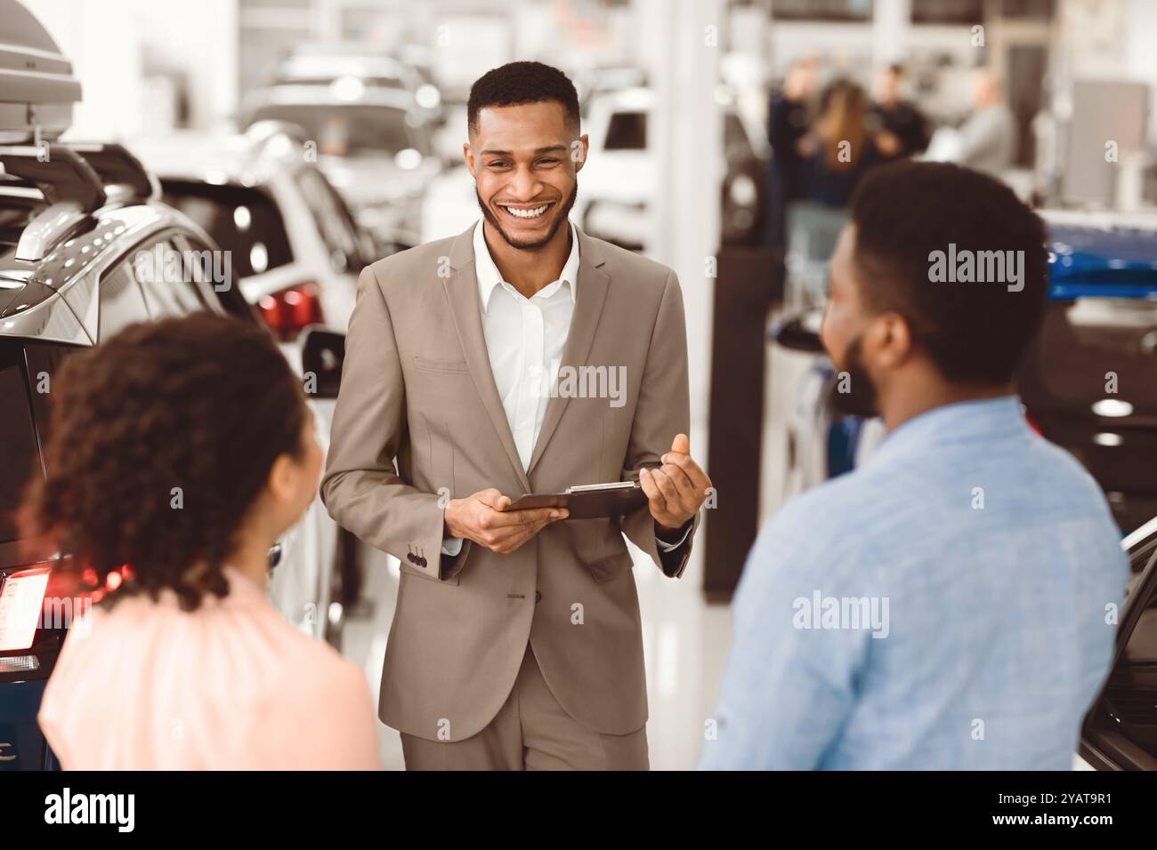 Car purchase in dealership clients hi-res stock photography and images ...