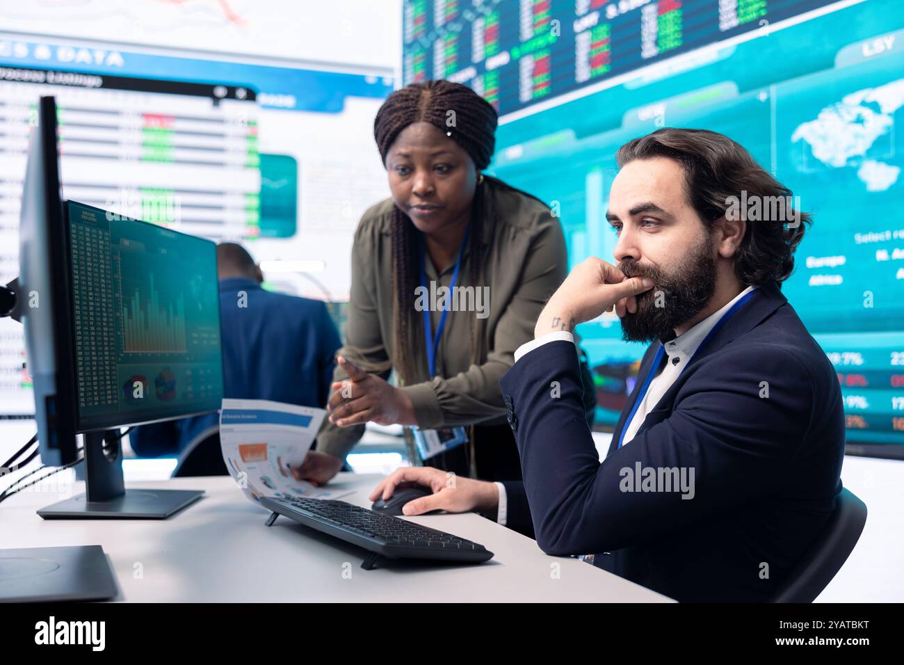 Managers collecting important statistics numbers on desktop pc ... Managers collecting important statistics numbers on desktop pc ...