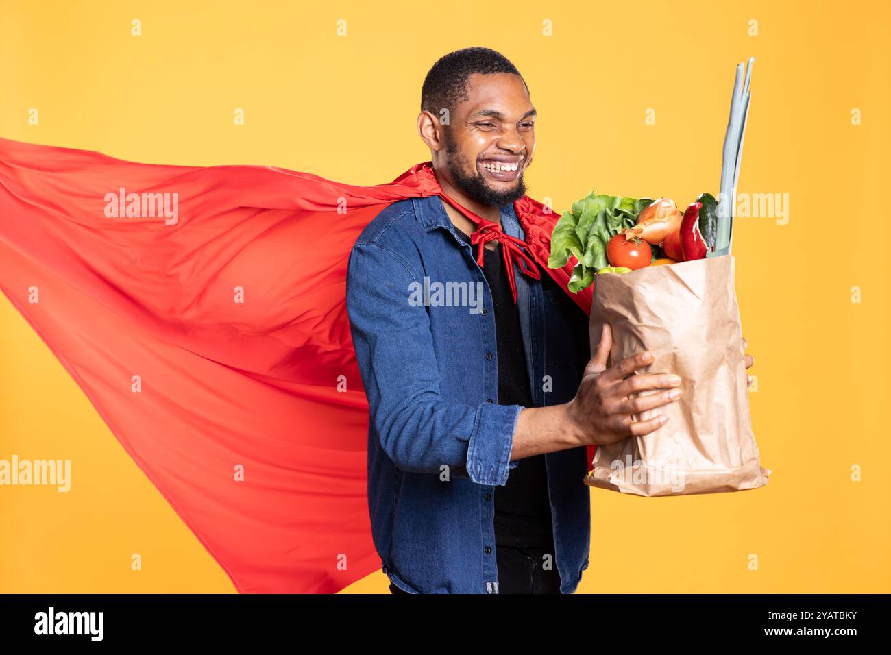African american guy posing superhero hi-res stock photography and ...