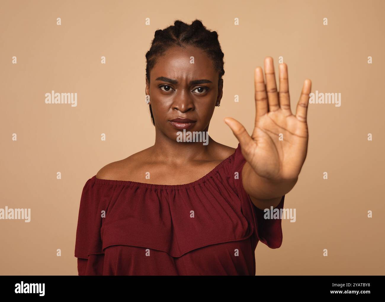 Young angry woman making the hand stop sign Stock Photo - Alamy