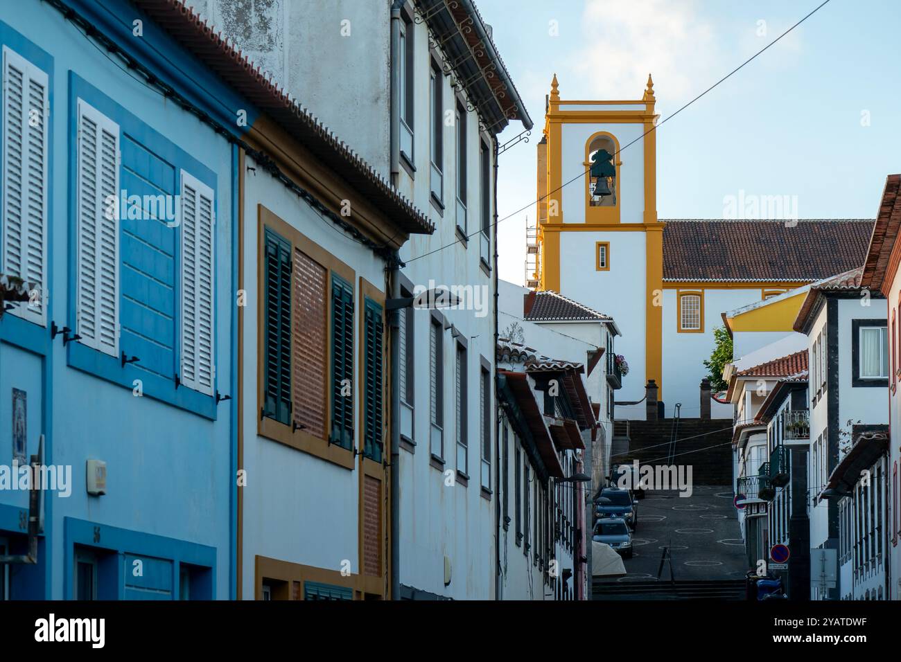Main street with traditional colored buildings to the church in Praia ...