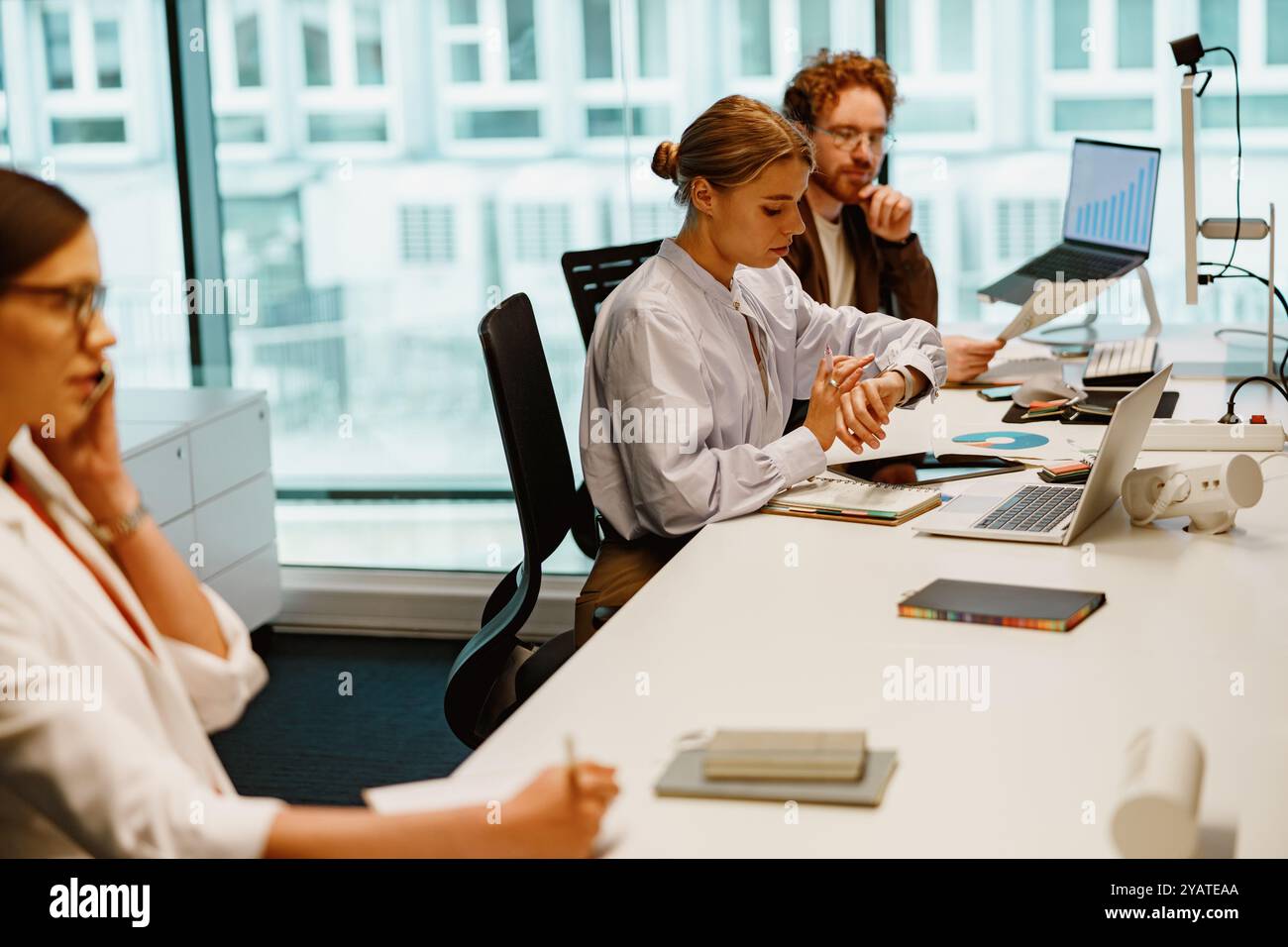 Collaborative Teamwork in a Contemporary Modern Office Working ...