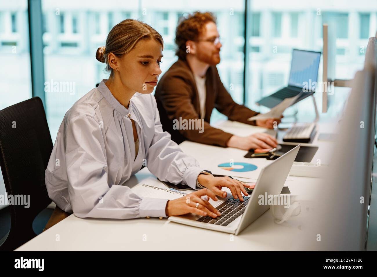 Modern Office Collaboration Featuring Professionals Engaged in ...