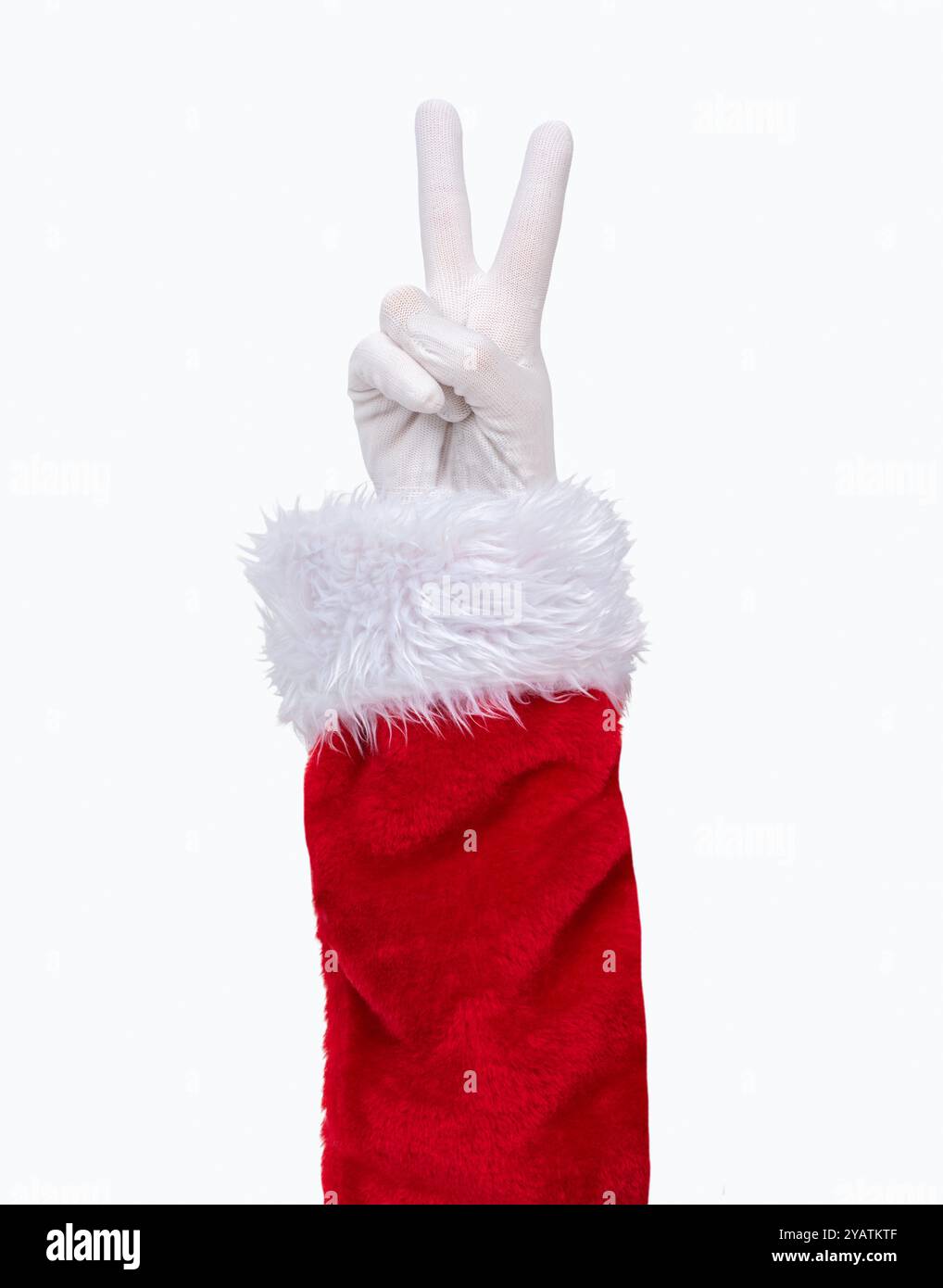 Shot of an Santa Claus hand showing two fingers with white background ...