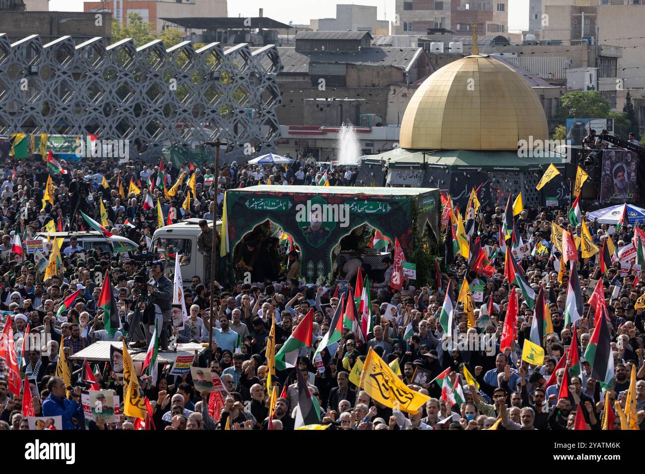 Tehran, Tehran, Iran. 15th Oct, 2024. A truck carries the coffin of the ...