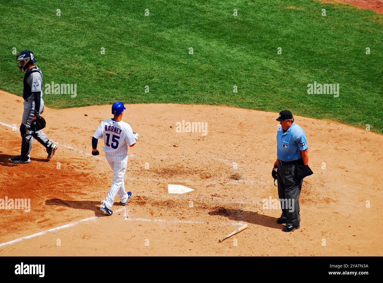 A runner easily score for the Chicago Cubs at a game in Wrigley Field ...