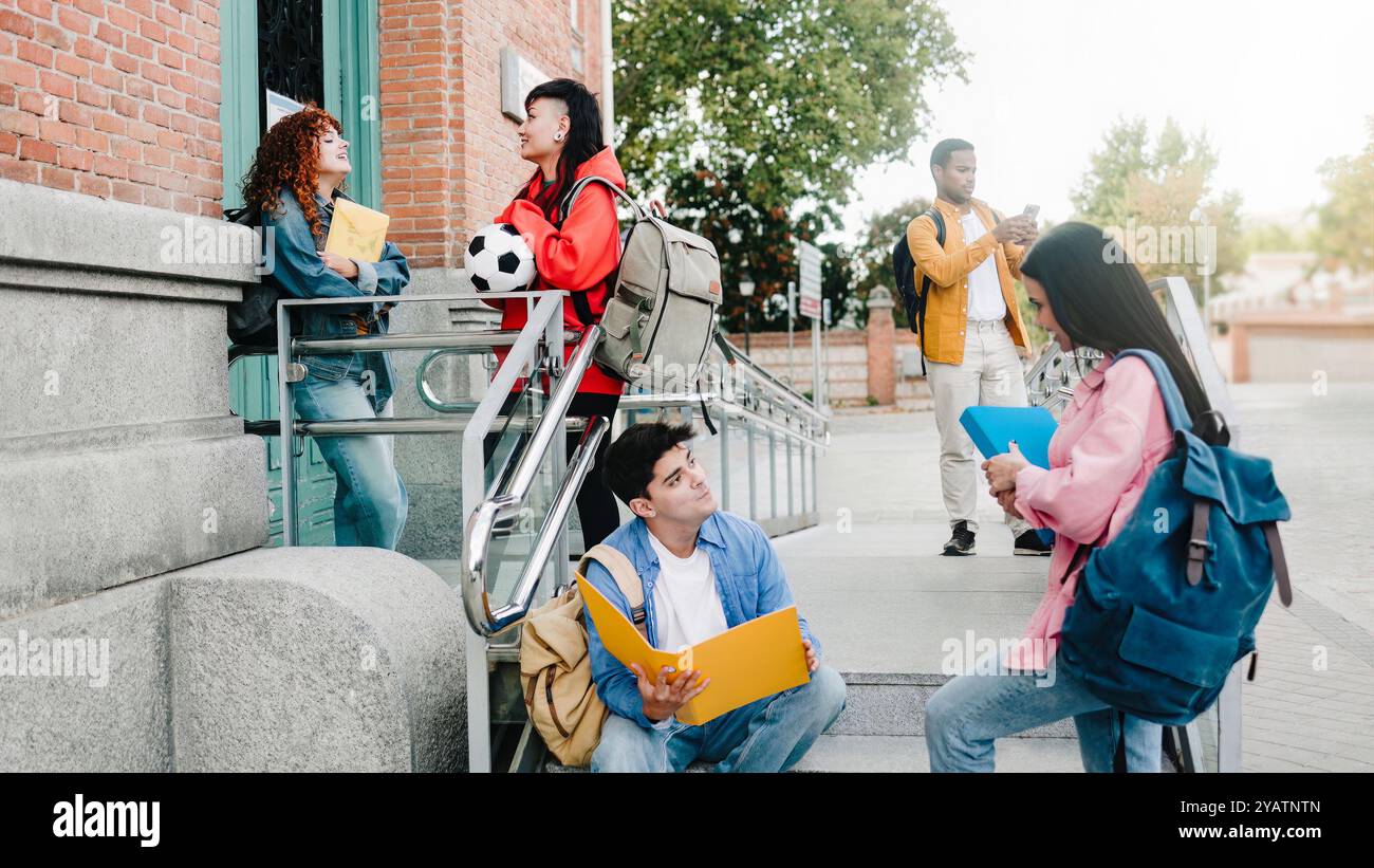Diverse students having fun outside school university campus. Group of ...