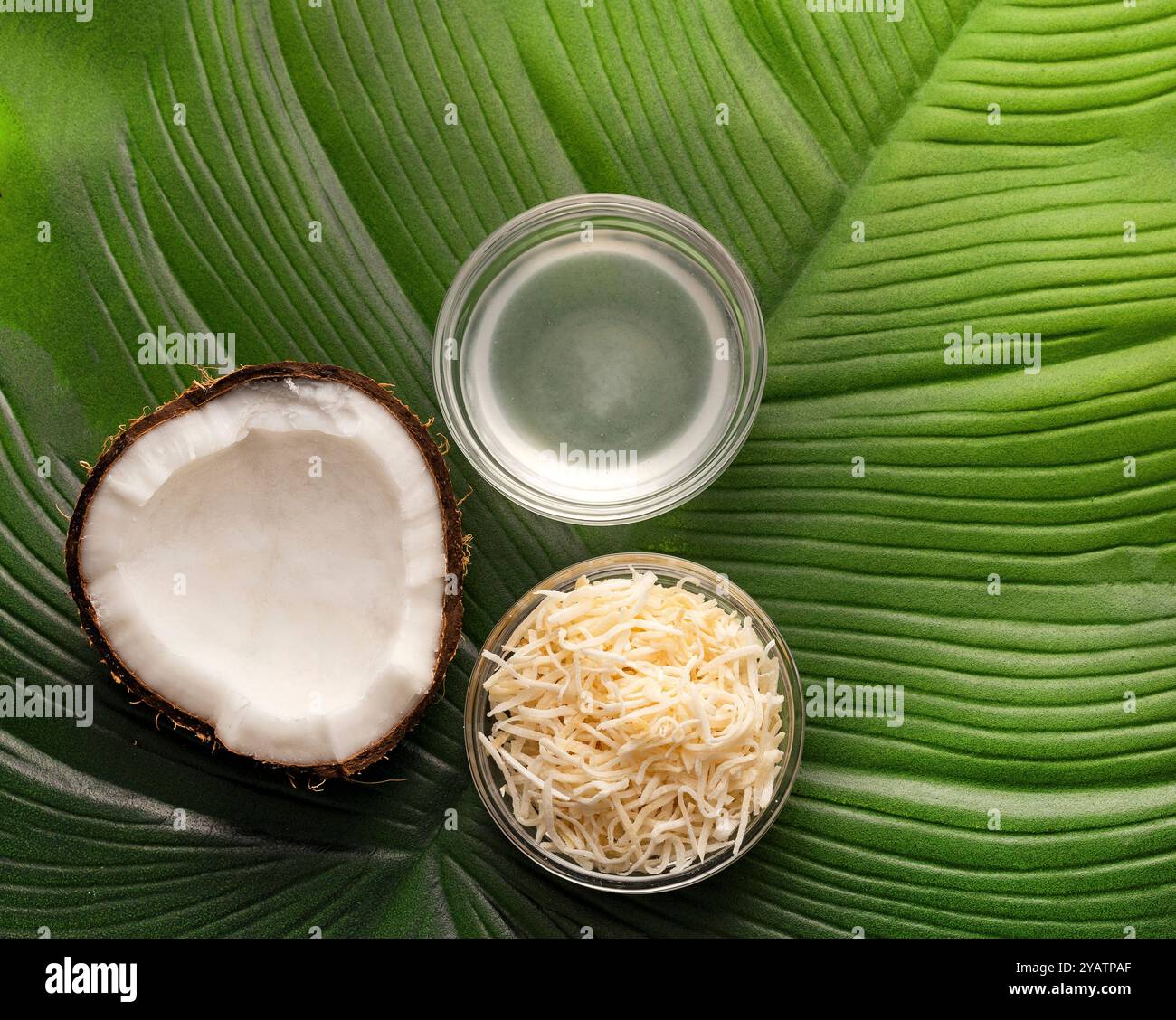 Organic coconut water in glass bowl - Cocos nucifera Stock Photo - Alamy