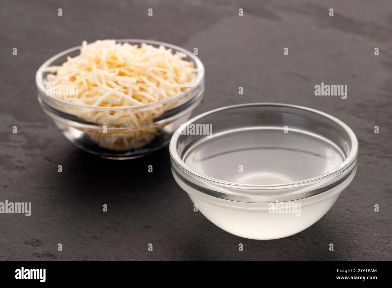 Natural fresh coconut water in glass bowl - Cocos nucifera Stock Photo ...