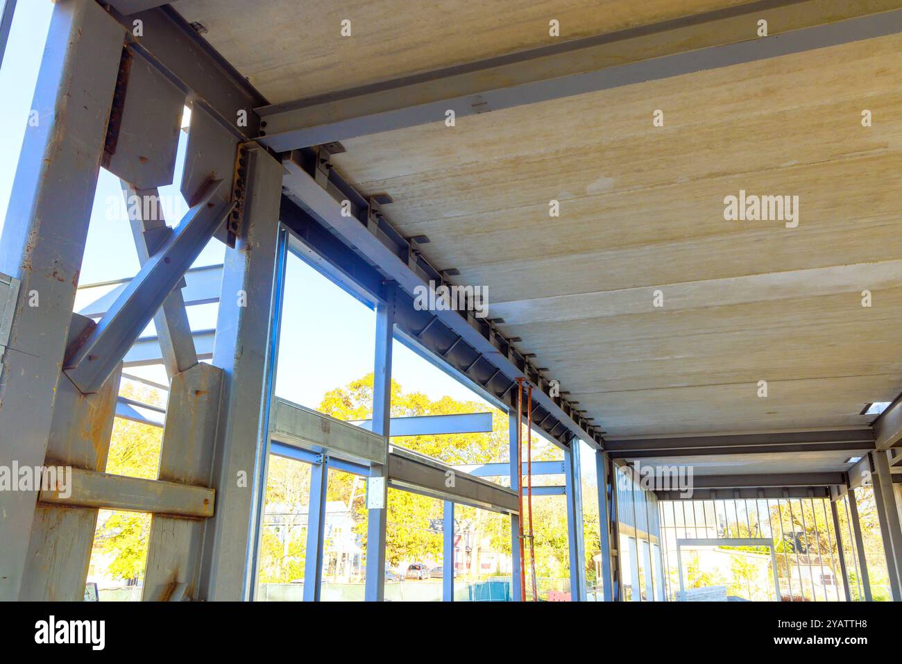 Steel beams frame building office during construction Stock Photo - Alamy
