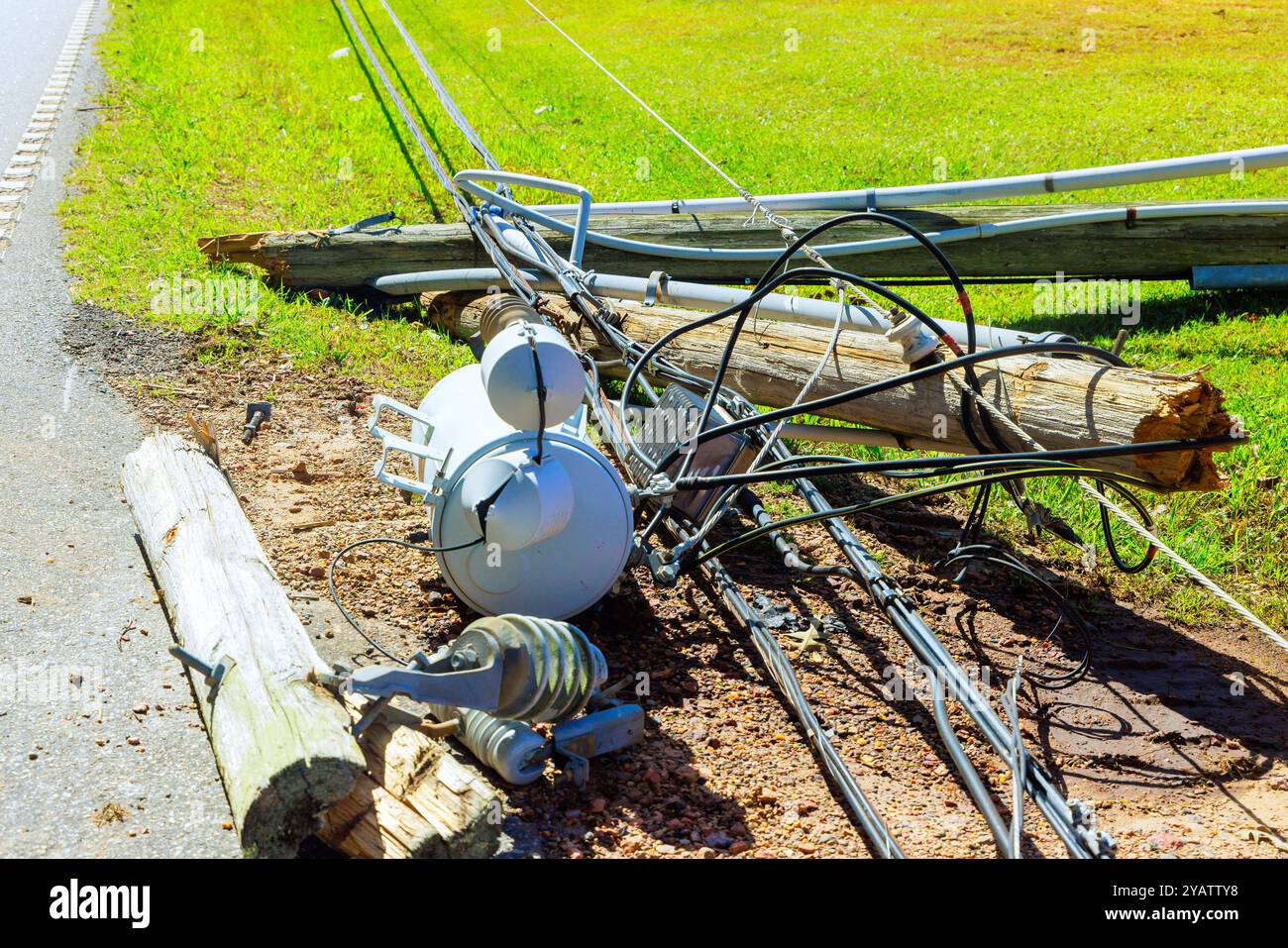 Tornado winds damaged fell down electric poles with wires during strong ...