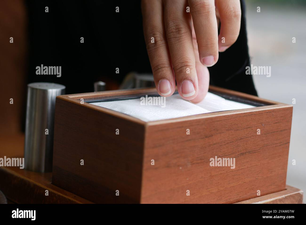 hand pull out a piece of tissue from tissue paper box Stock Photo - Alamy