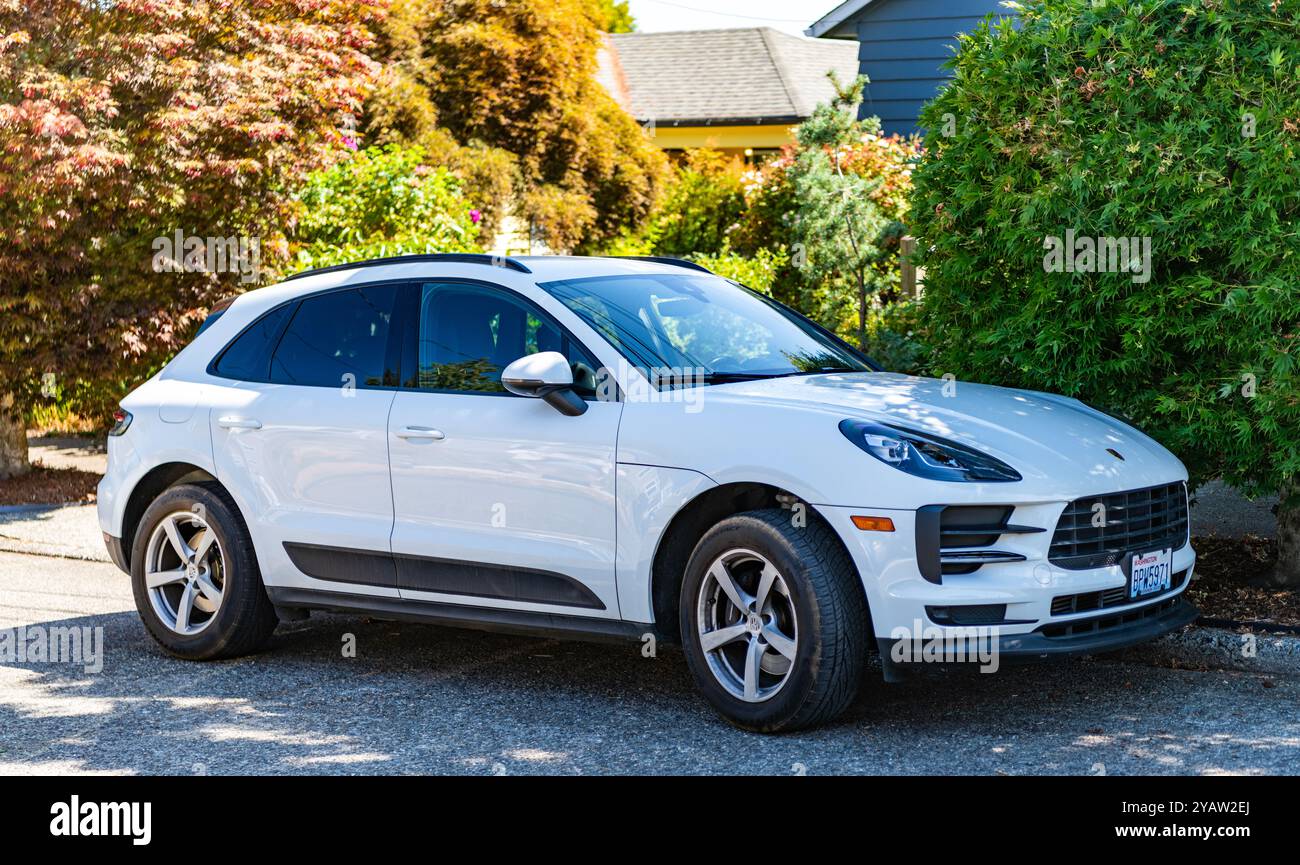 Seattle, WA, USA -July 3, 2024: Porsche Macan Turbo S white color side ...
