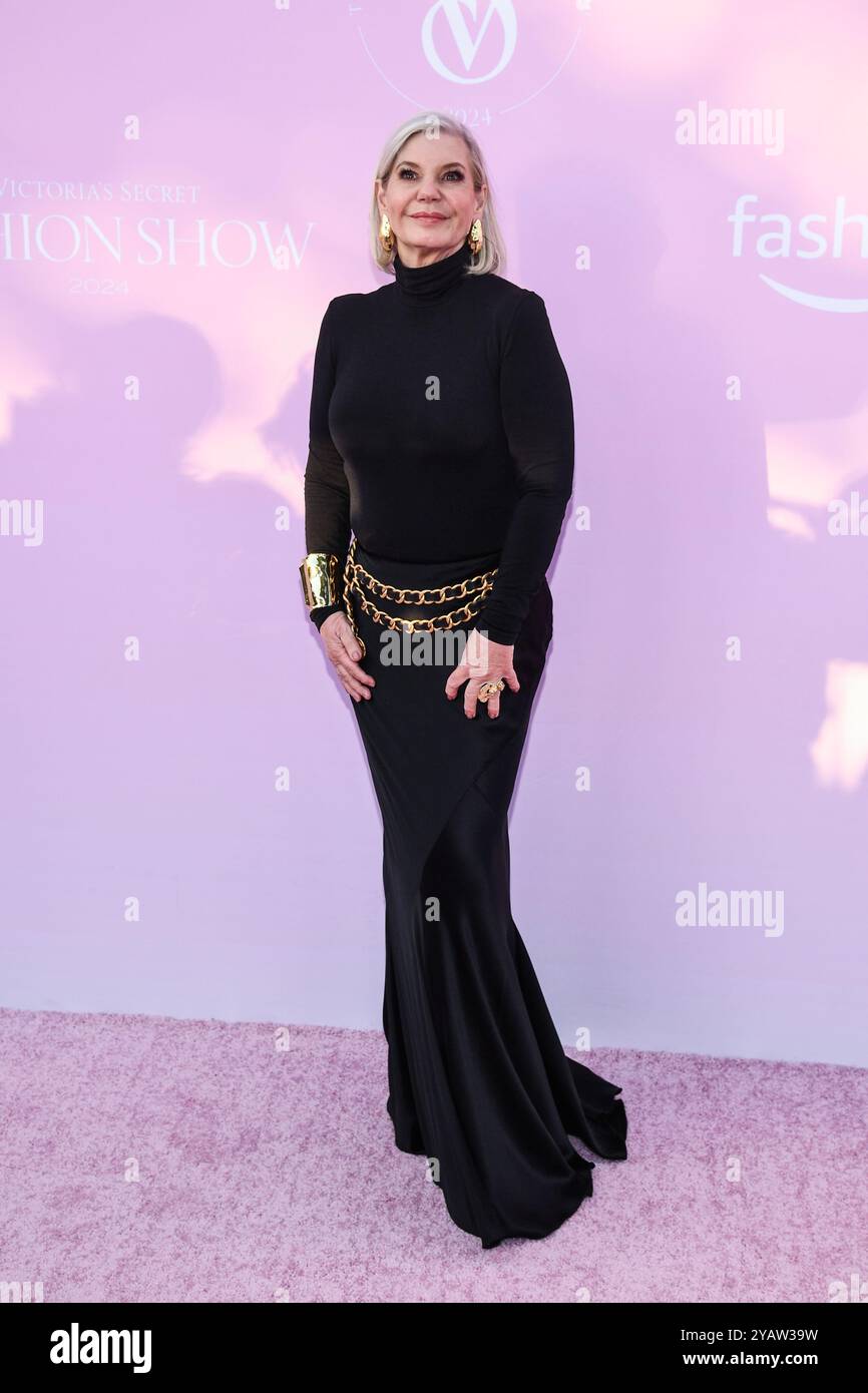New York, USA. 15th Oct, 2024. Janie Schaffer walking on the pink ...