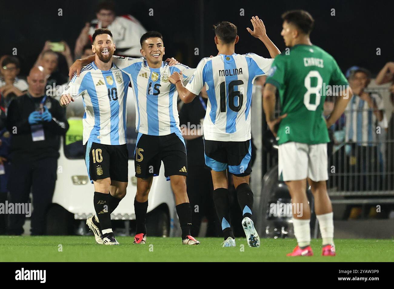 Argentina's forward Lionel Messi (L) celebrates with teammates ...