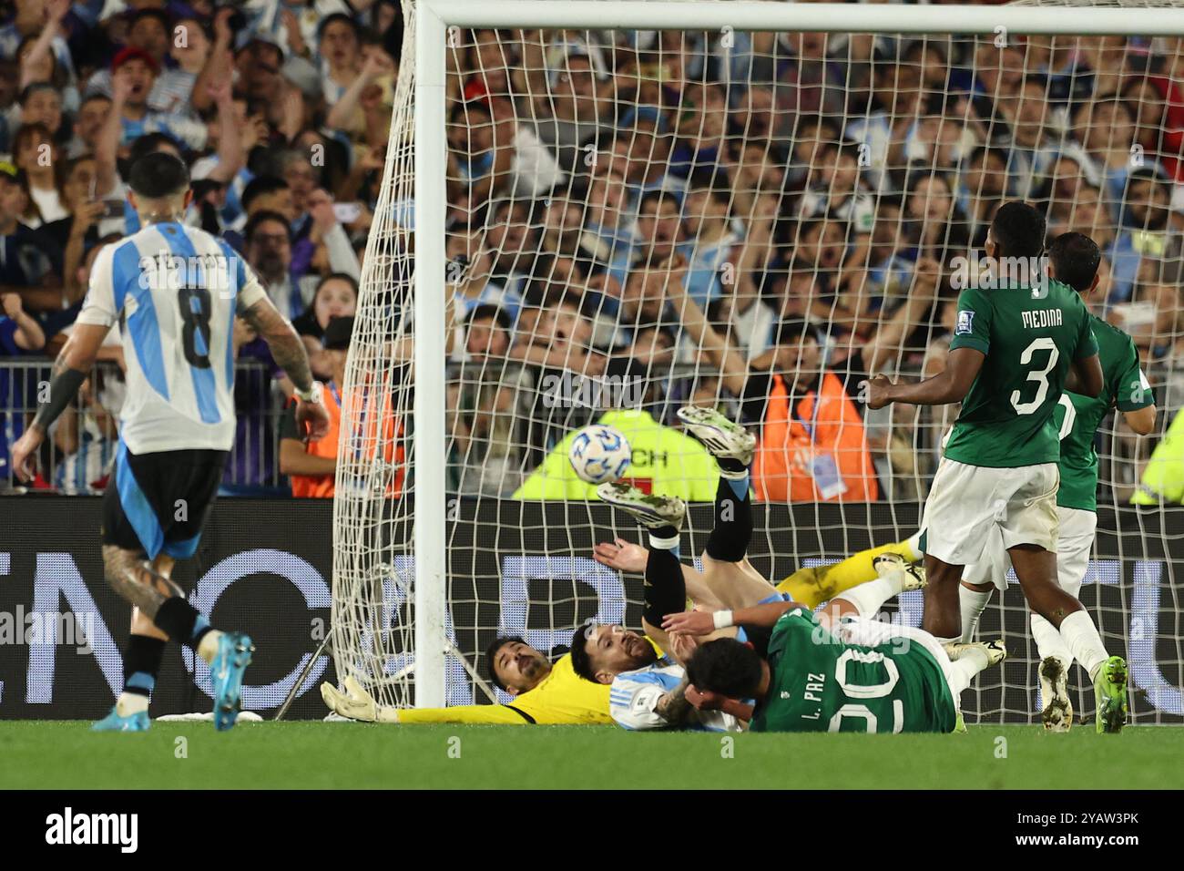 Argentina's forward Lionel Messi (C-L) falls on the field after scoring ...