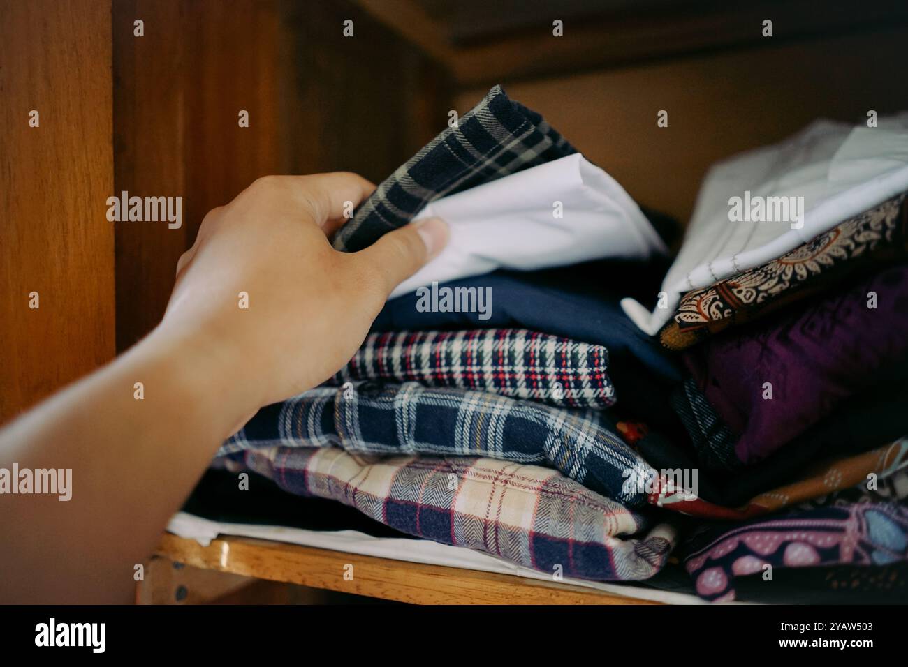 Wooden clothes storage hi-res stock photography and images - Alamy