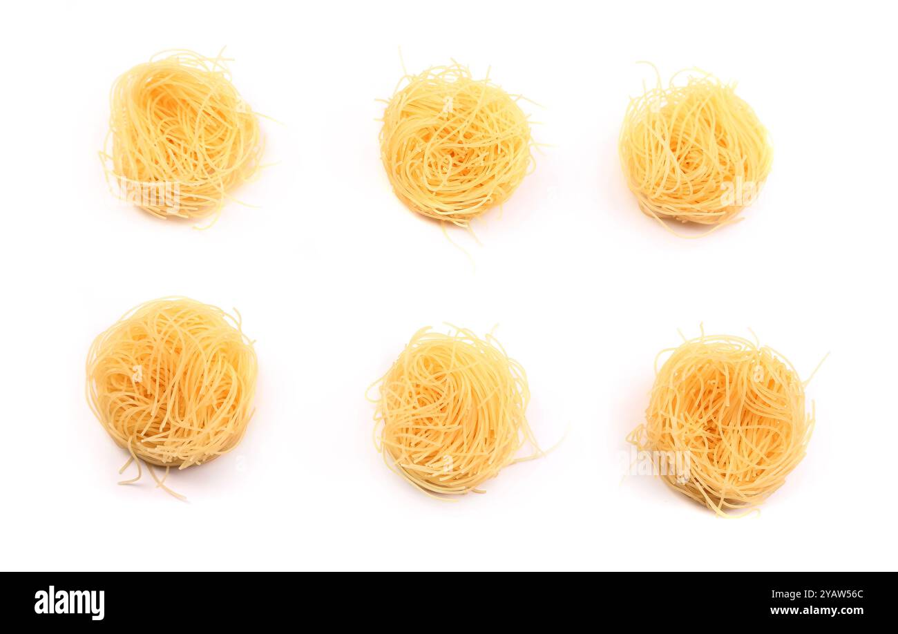 nests of angelo pasta on a white background Stock Photo - Alamy