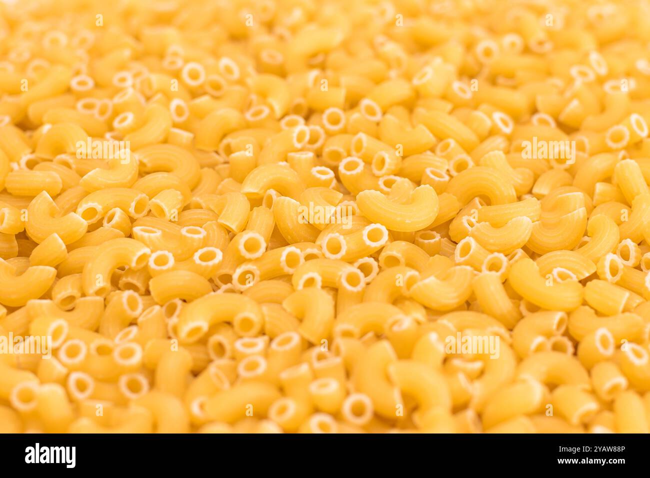 Uncooked Chifferi Rigati Pasta Background. Fat and Unhealthy Food ...