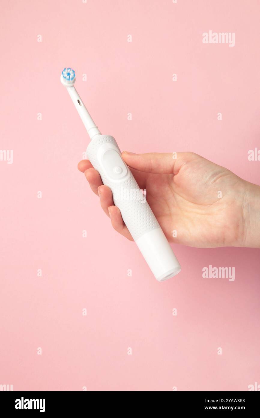 Hand holding brush bleaching hi-res stock photography and images - Alamy