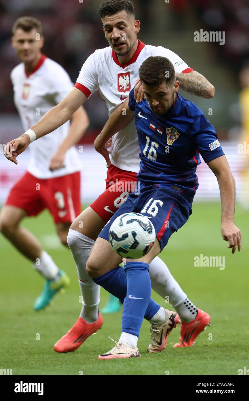 Warsaw, Poland, 15/10/2024, Jakub Moder of Poland and Martin Baturina ...